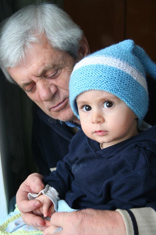 Grand father and grand son stock image. Image of dark - 22388657