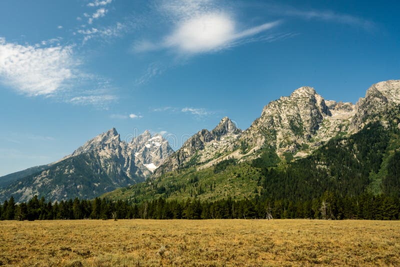 Grand Tetons Rise Steeply Over the Flat Valley Below Stock Image ...