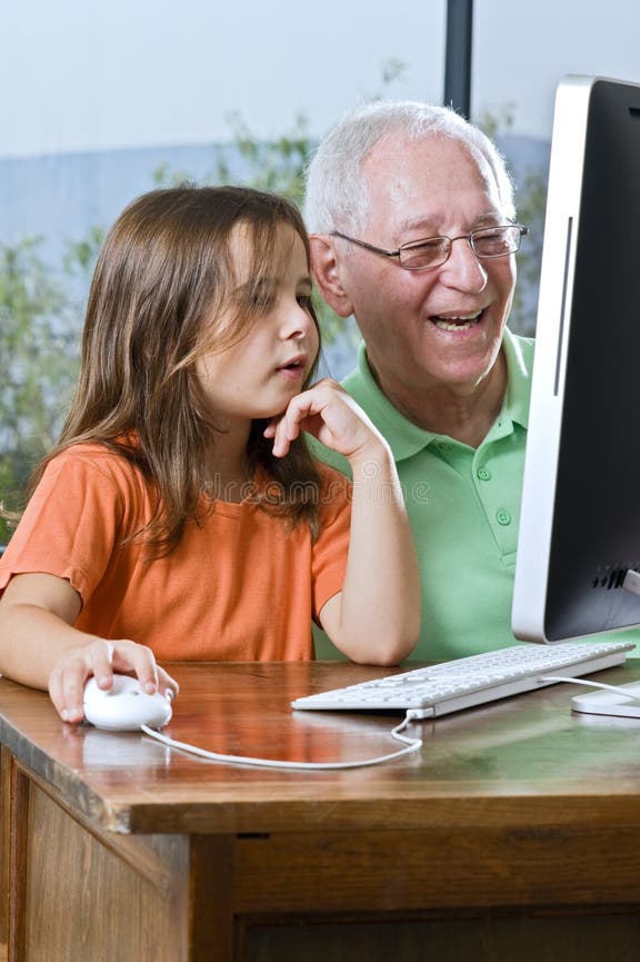 Grandfather and Granddaughter with Computer Stock Image - Image of ...
