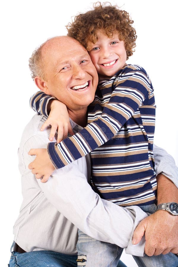 Grandfather and Grandson Smiling Stock Photo - Image of arms, camera ...