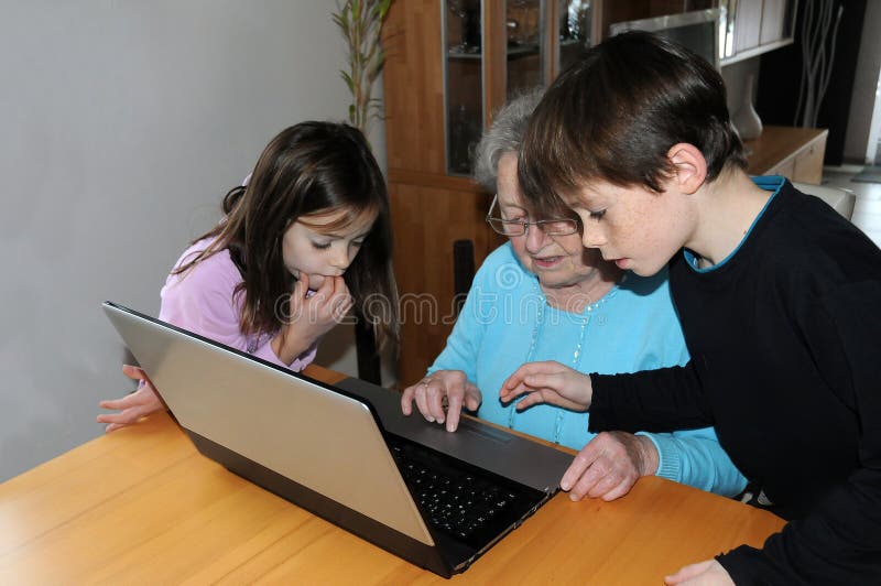 Grandma Gets a Lesson in Computer Operation Stock Photo - Image of help ...