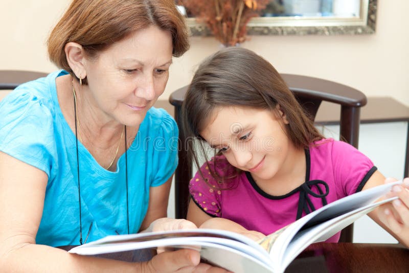 Grandma and Girl Reading a Book Stock Image - Image of grandmother ...