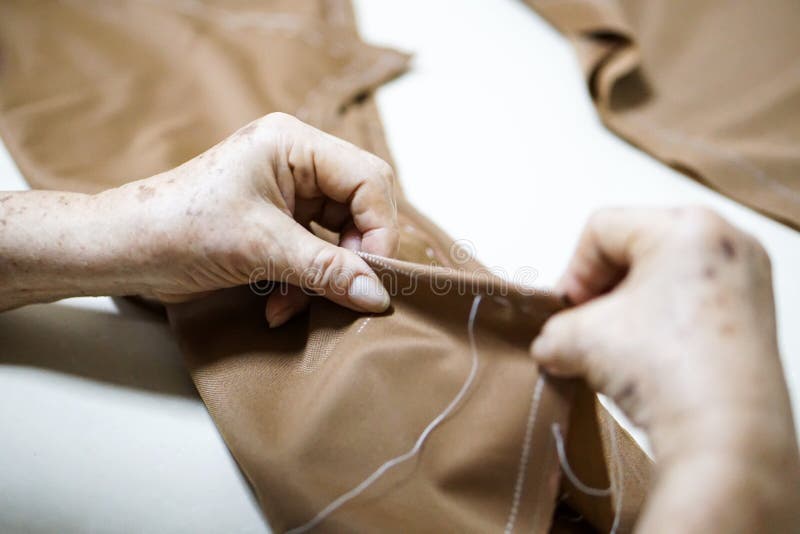 Grandma Hand Needle and Sewing Making Cloth Stock Photo - Image of ...