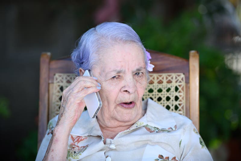 Grandma talking on phone stock photo. Image of grandmother - 69121246
