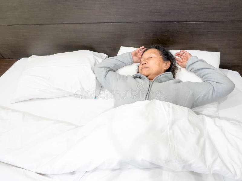 Grandmom Sleeping in the Bed Stock Photo - Image of waking, grandmother ...