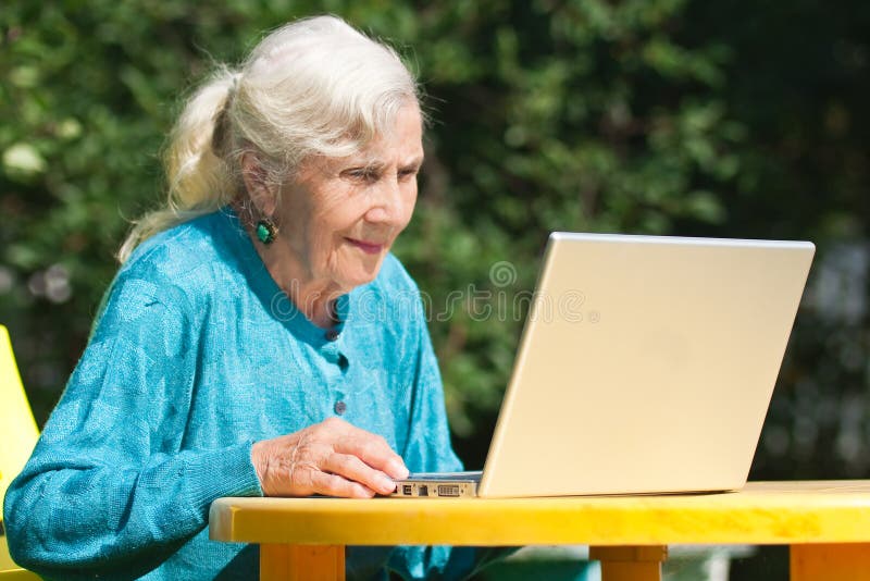 Portrait of Elderly Lady with Computer Stock Photo - Image of face ...