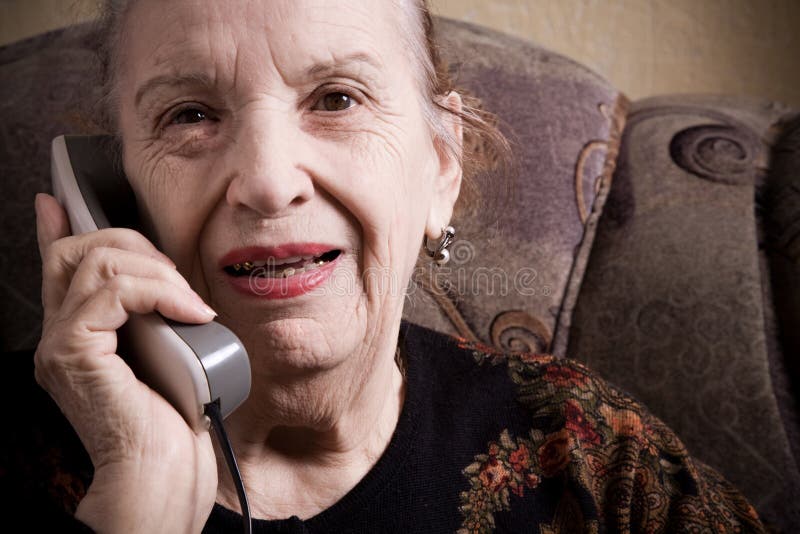 Grandmother on the phone stock image. Image of femininity - 7297637
