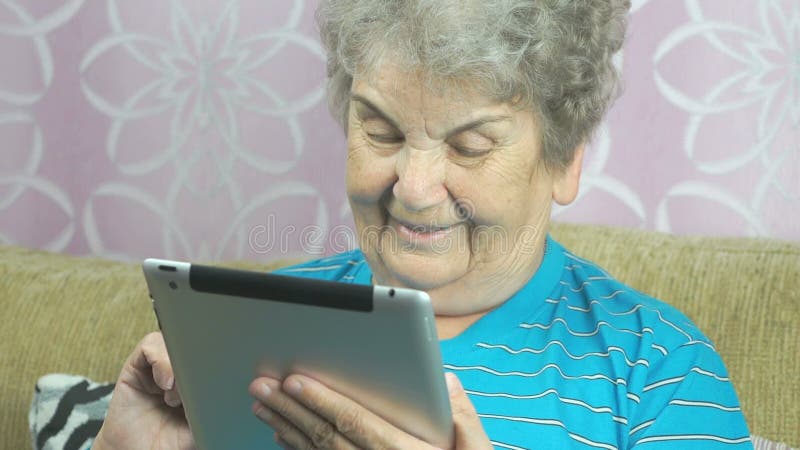 Grandmother Uses the New Computer Tablet Stock Footage - Video of ...