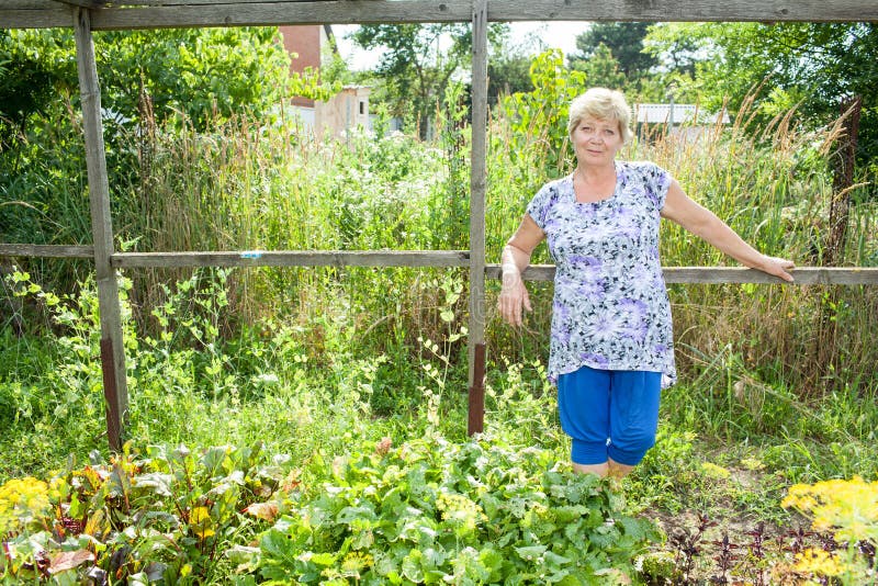 Portrait of Grandma in the Garden Stock Image - Image of retirement ...
