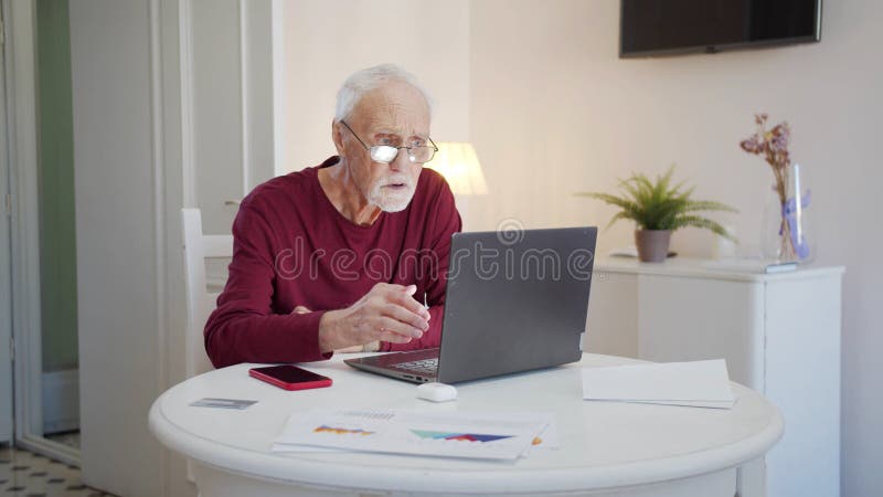 Grandpa in Glasses Looking for Information on the Internet Stock Image ...