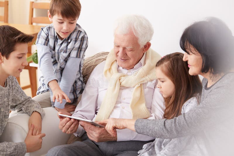 Grandpa using tablet stock image. Image of senior, technology - 90306589