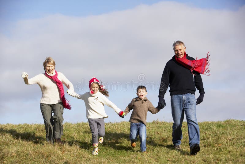 Grandparents and Grandchildren Running Stock Image - Image of family ...