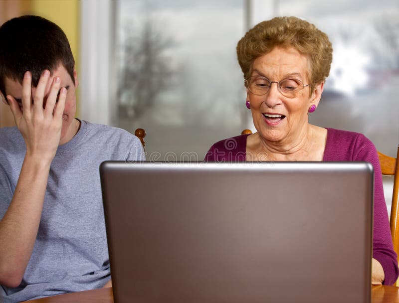 Grandson and Grandmother at a Laptop Stock Photo - Image of education ...
