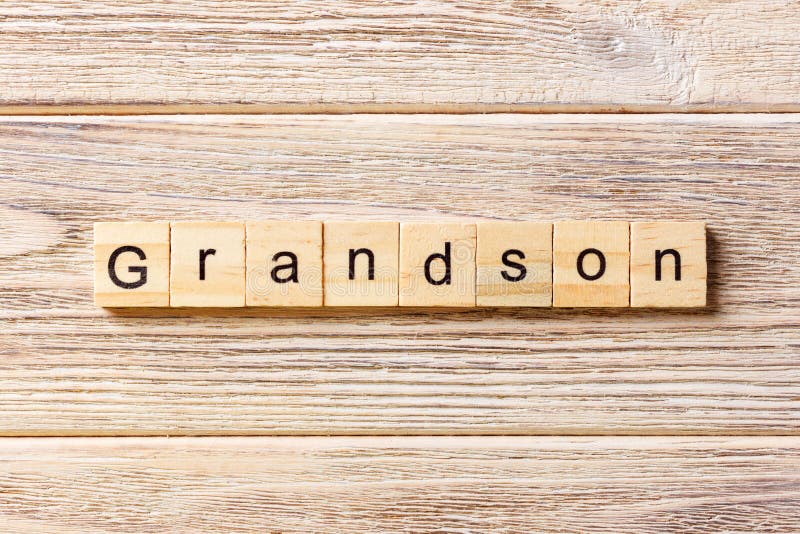 Grandson Word Written on Wood Block. Grandson Text on Table, Concept ...