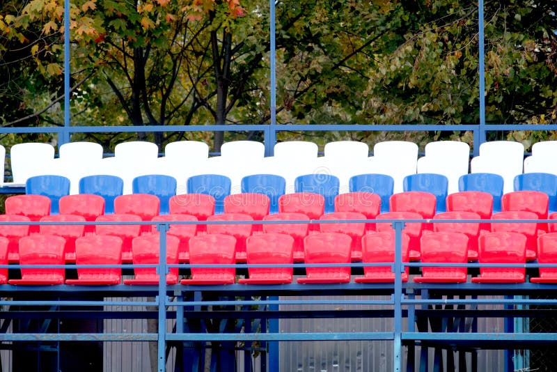 Grandstand Stadium with Many Color Seats Stock Photo - Image of leaves ...