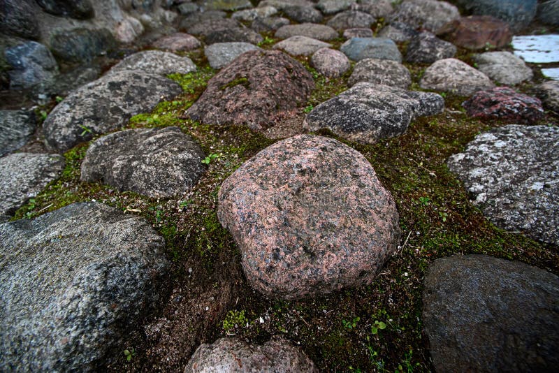 Granite boulders and moss stock photo. Image of dirty - 100143380