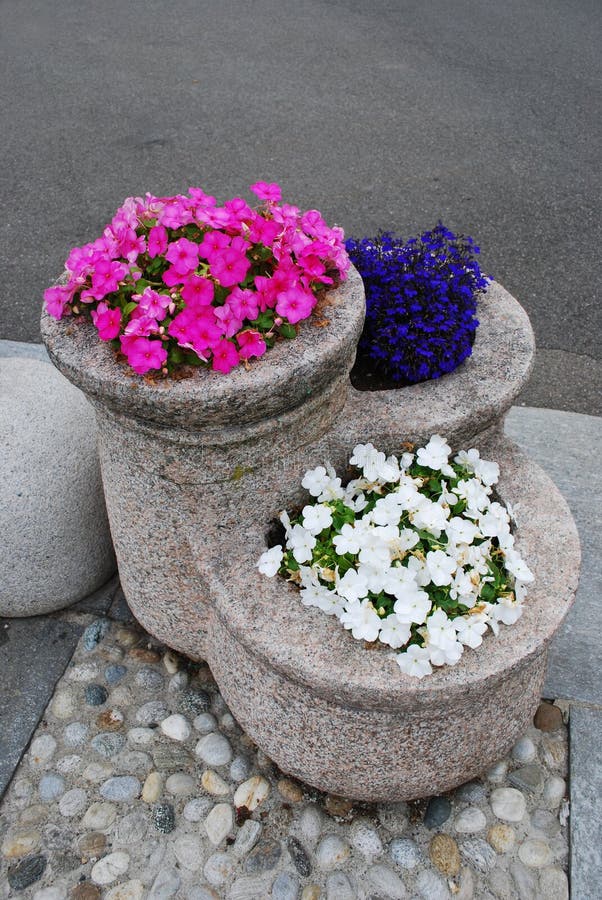 Granite flower pot stock photo. Image of flowerpot, road - 22945072