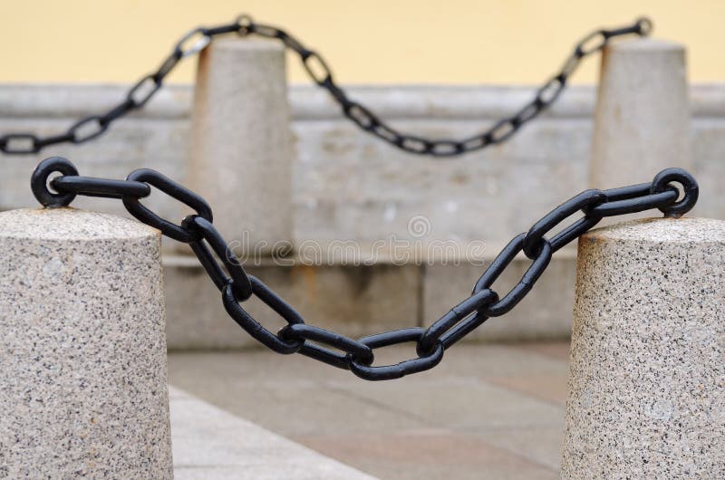 Granite posts with chains. stock image. Image of sidewalk - 106881649