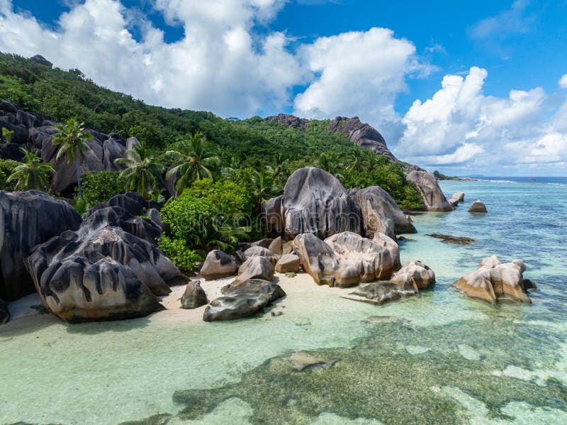 Granite Rocks and Lush Greenery on the Beach. La Digue, Seychelles ...