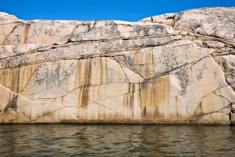 Granite rocks at sea stock photo. Image of face, rocks - 69202088