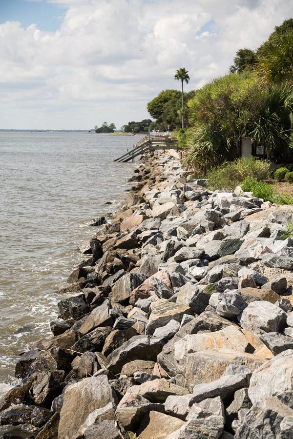 Granite Seawall and Palm Trees on Coast Stock Image - Image of solid ...