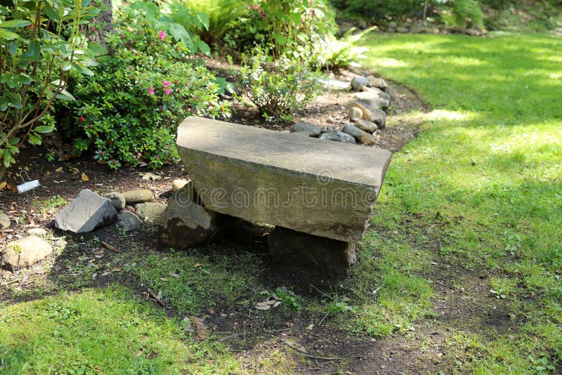 Stone Bench in Lush Green Park Stock Image - Image of stone, granite ...