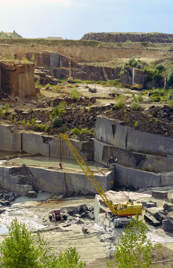 Granite Stone Mine Layers with Crane Working Inside Stock Image - Image ...