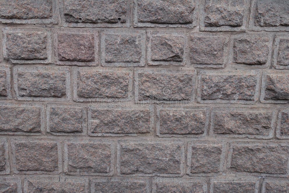Granite Wall Made of Blocks with Rustication Stock Photo - Image of ...