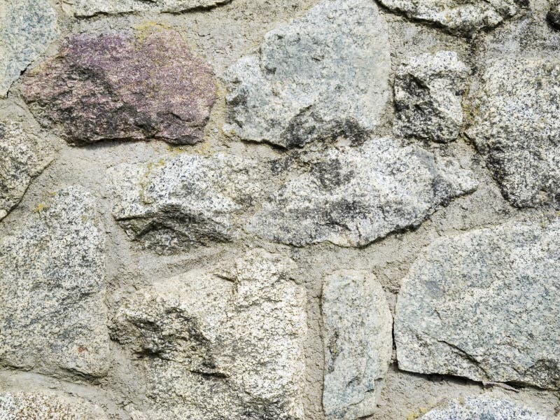 Granite Stones in Concrete Wall Stock Image - Image of filling, unequal ...