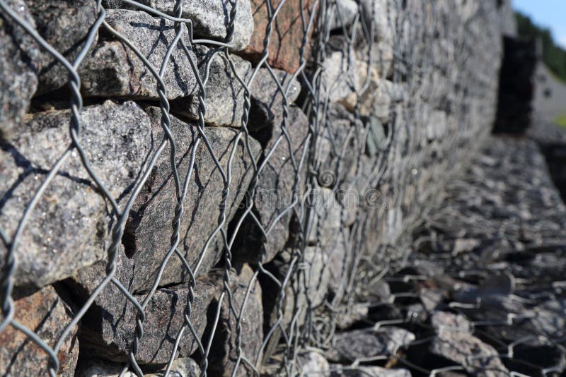 Granite stones in the wall stock image. Image of strengthening - 122361127