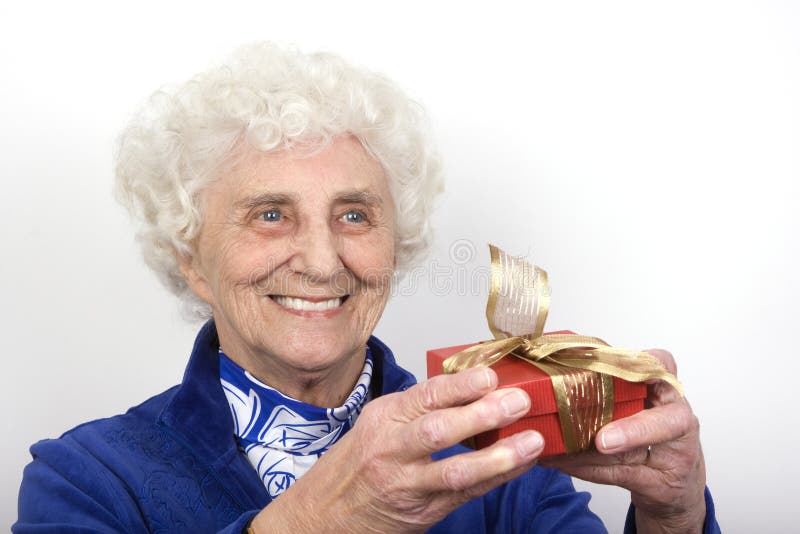 Granny with a Gift stock image. Image of blue, smile, granny - 8651763