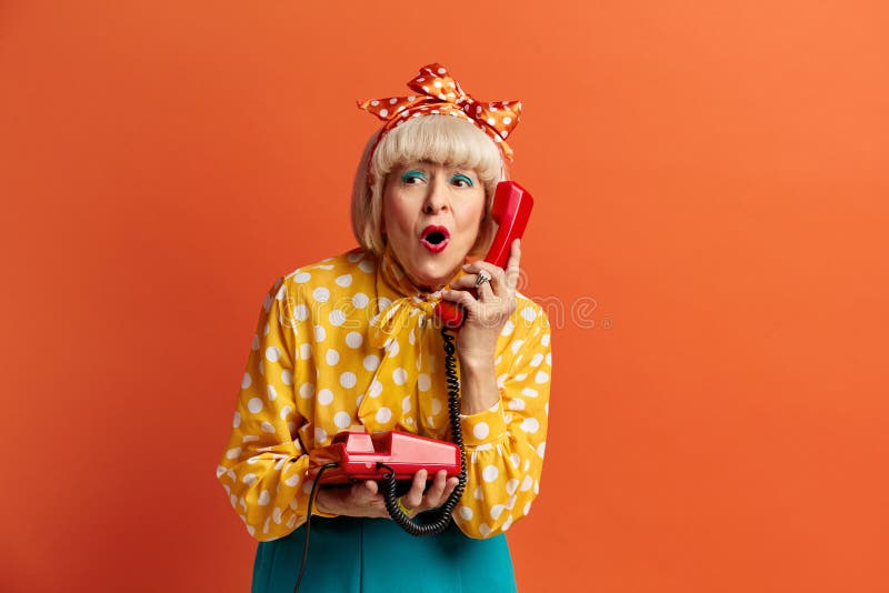 Granny Talking Landline Telephone. Senior Woman Speaking on Retro Phone ... Granny Talking Landline Telephone. Senior Woman Speaking on Retro Phone ...