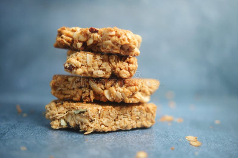 A Row of Granola Bars with Nuts and Fruit on a Blue Background.AI ...