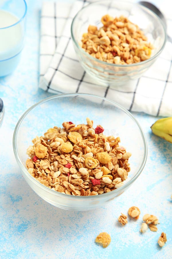 Granola with Fruit on a Blue Background Stock Photo - Image of glass ...