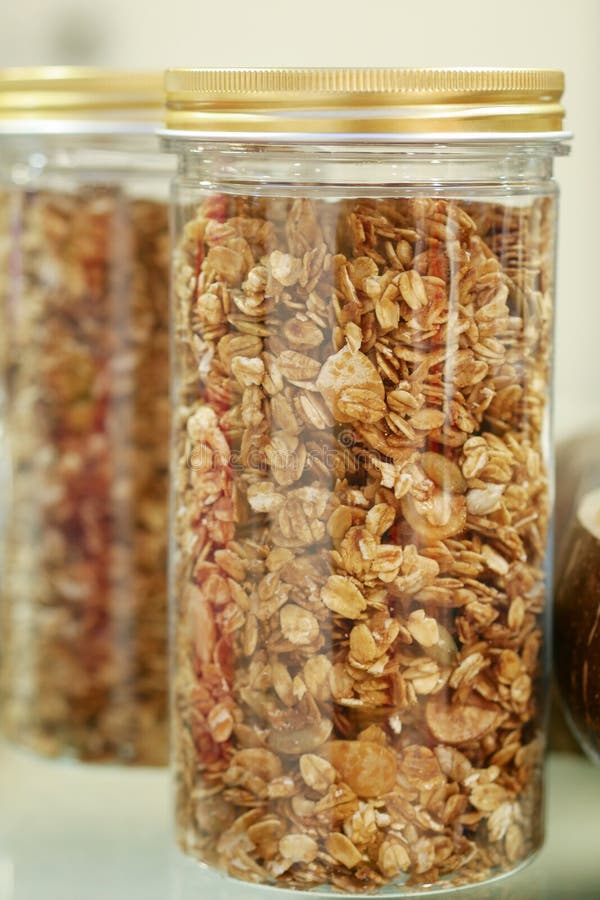 Granola Musli in a Transparent Jar on Table Stock Image - Image of ...