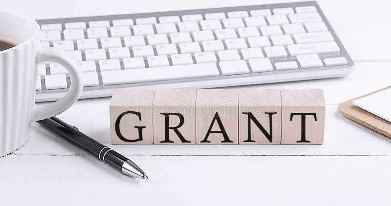 GRANT Word on the Wooden Blocks with Keyboard and Coffee Stock Photo ...