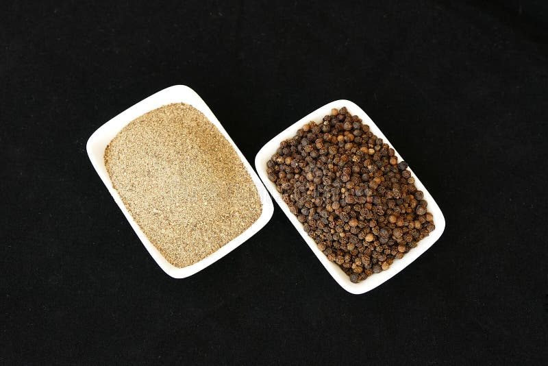 Granulated and Ground Black Pepper Standing Side by Side,close-up of ...