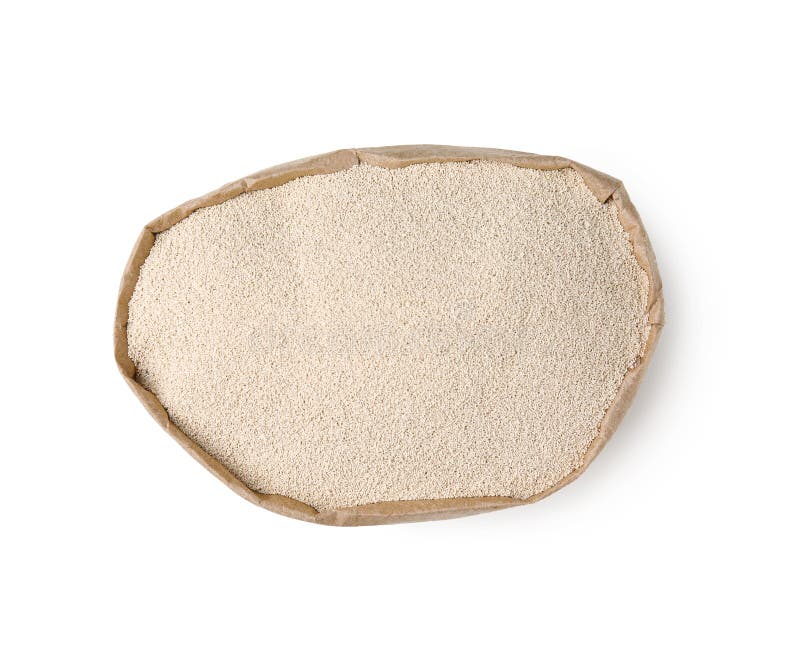 Granulated Yeast in Paper Bag on White Background, Top View Stock Photo ...