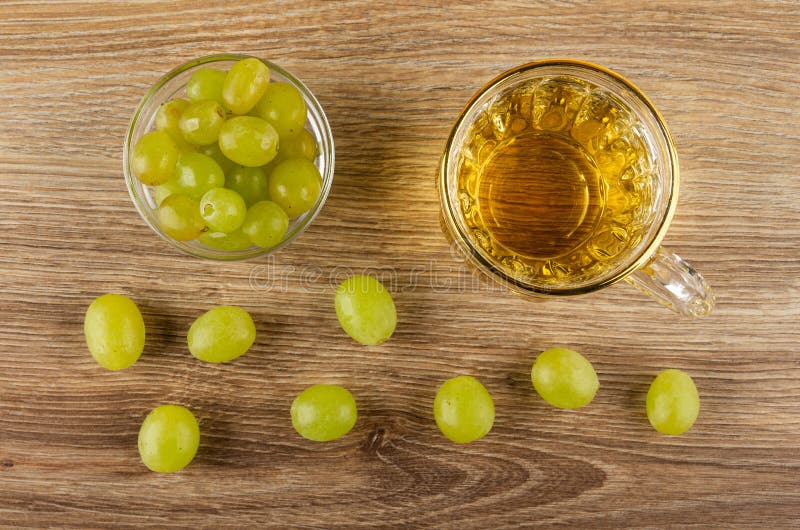 Grape in Bowl, Scattered Grape, Cup with Grape Juice on Table. Top View ...
