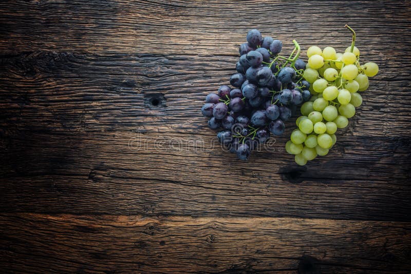 Grape. Bunch of Multicolored Grapes on Rustic Wooden Table Stock Photo ...