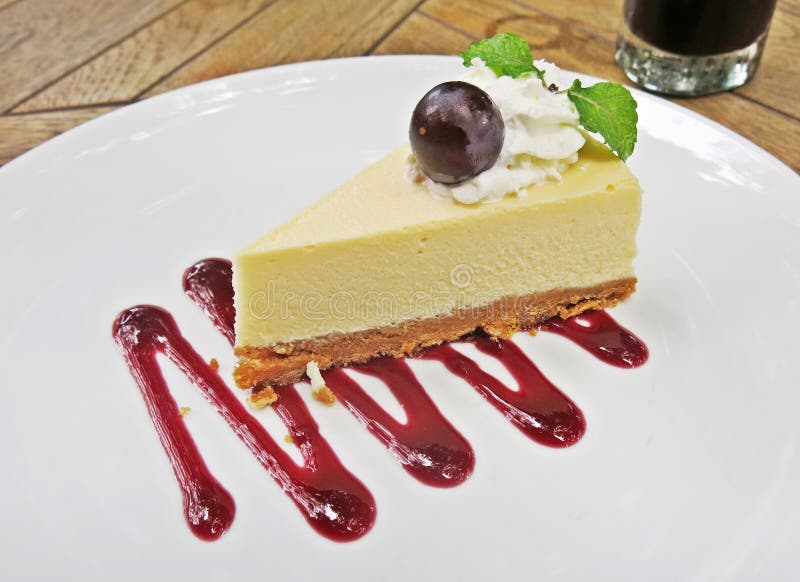 Grape Cheese Cake with Sweet Grape Sauce on White Plate Stock Photo ...