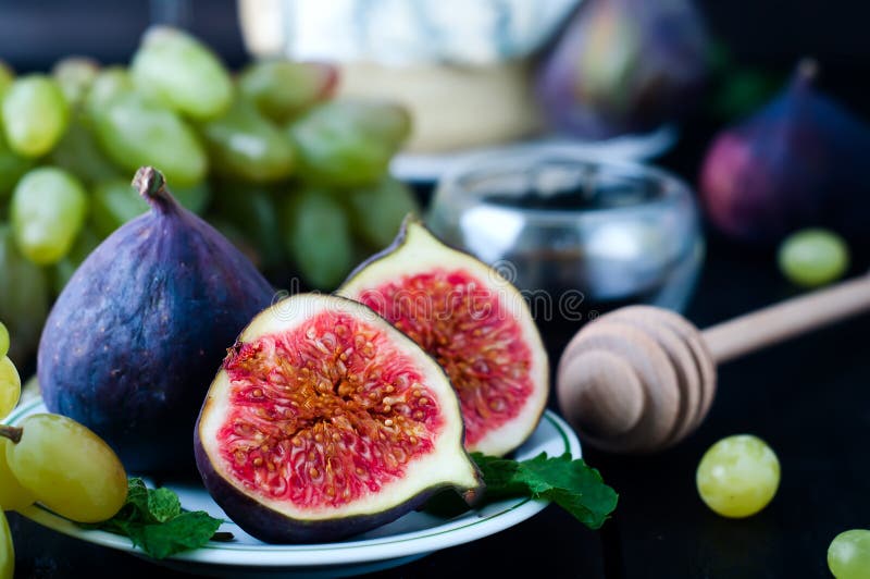 Grape and Figs with on Wooden Table Background. Stock Image - Image of ...