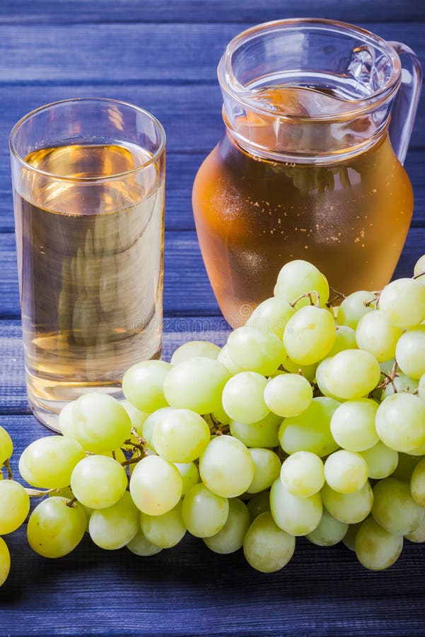 Grape Juice in the Glass and Pitcher Vertical Top View Photo Stock ...