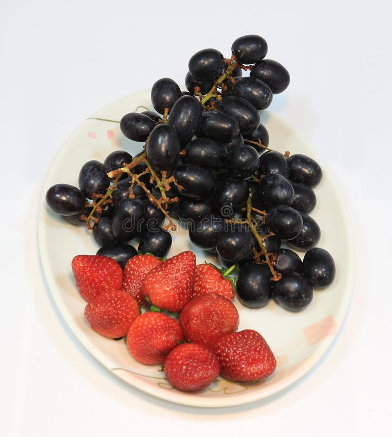 Grape and Strawberry on a Plate. Stock Photo - Image of berry ...