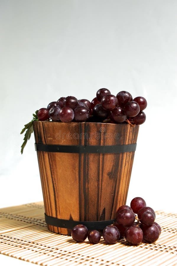 Grape in Wooden Basket stock image. Image of dessert - 15553937