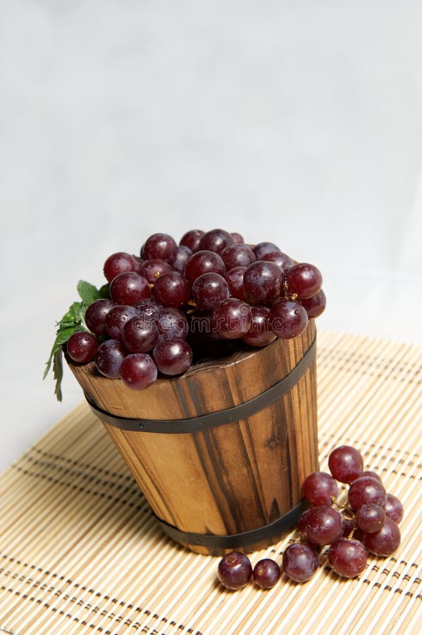 Grape in Wooden Basket stock photo. Image of color, isolated - 15554322