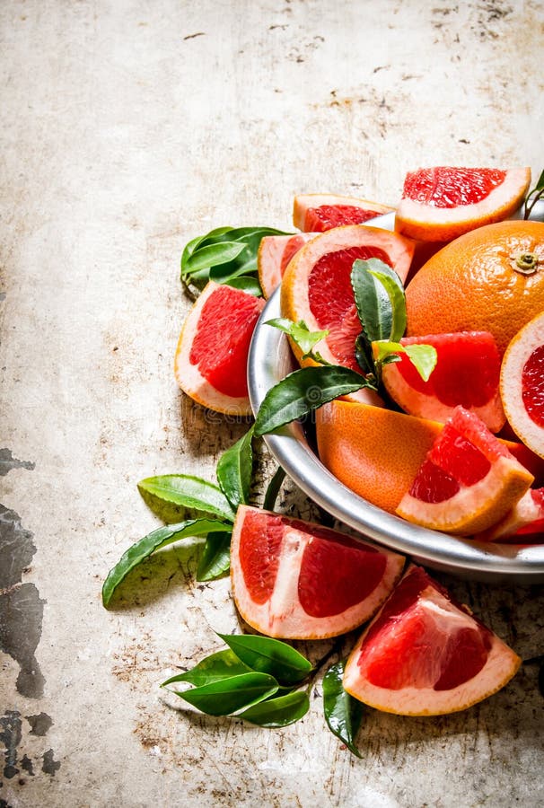 The Grapefruit in a Cup of Sliced Leaves. Stock Image - Image of peel ...