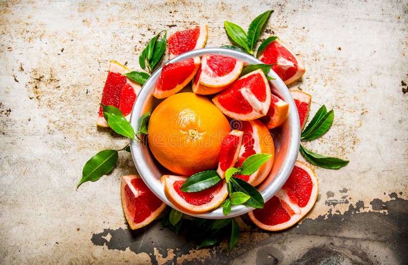 The Grapefruit in a Cup of Sliced Leaves. Stock Photo - Image of leaves ...