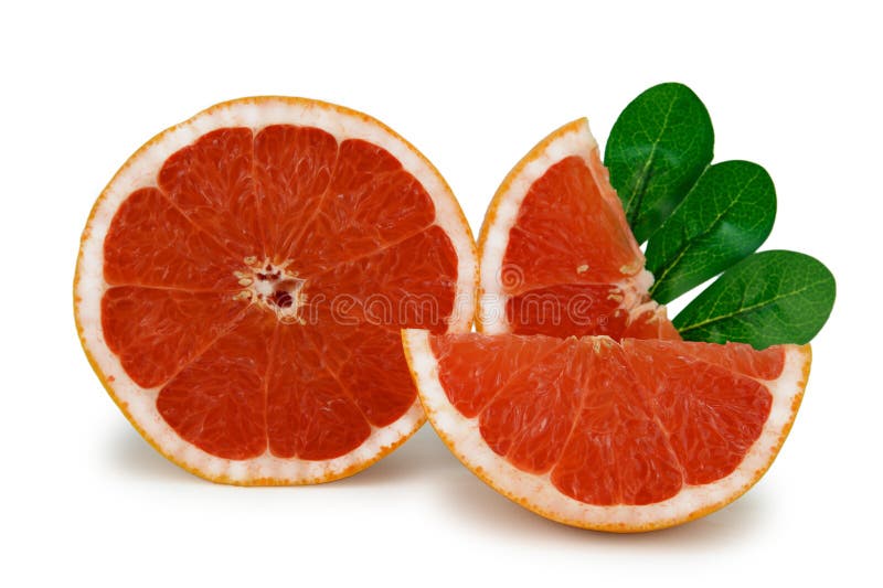 Grapefruit Cut in Half and into Wedges. Artificial Leaves Decorate the ...