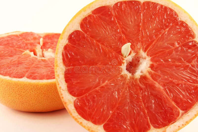 Pink Grapefruit Slices on Plate Stock Image - Image of beverage ...